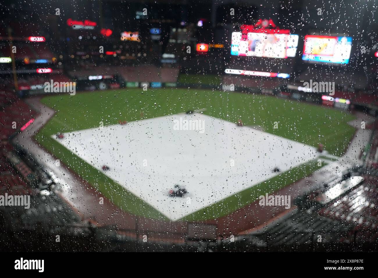 St. Louis, United States. 30th May, 2024. As raindrops hit the windows ...