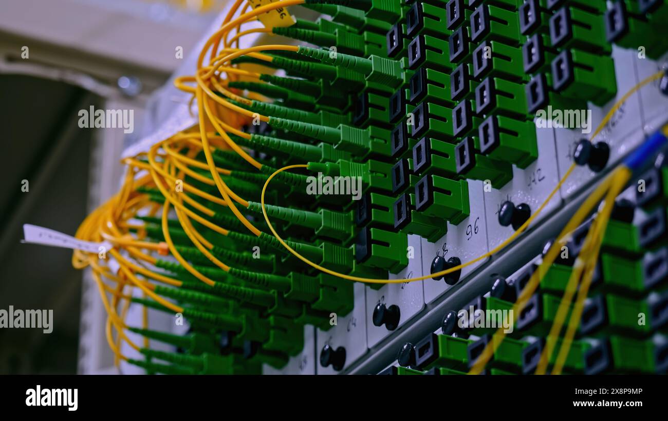 Close up of optical fiber switchboard hub in a server room. Stock ...