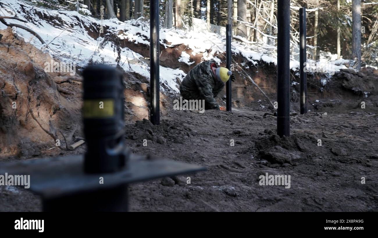 Process of strengthening the soil with piles at the construction site ...