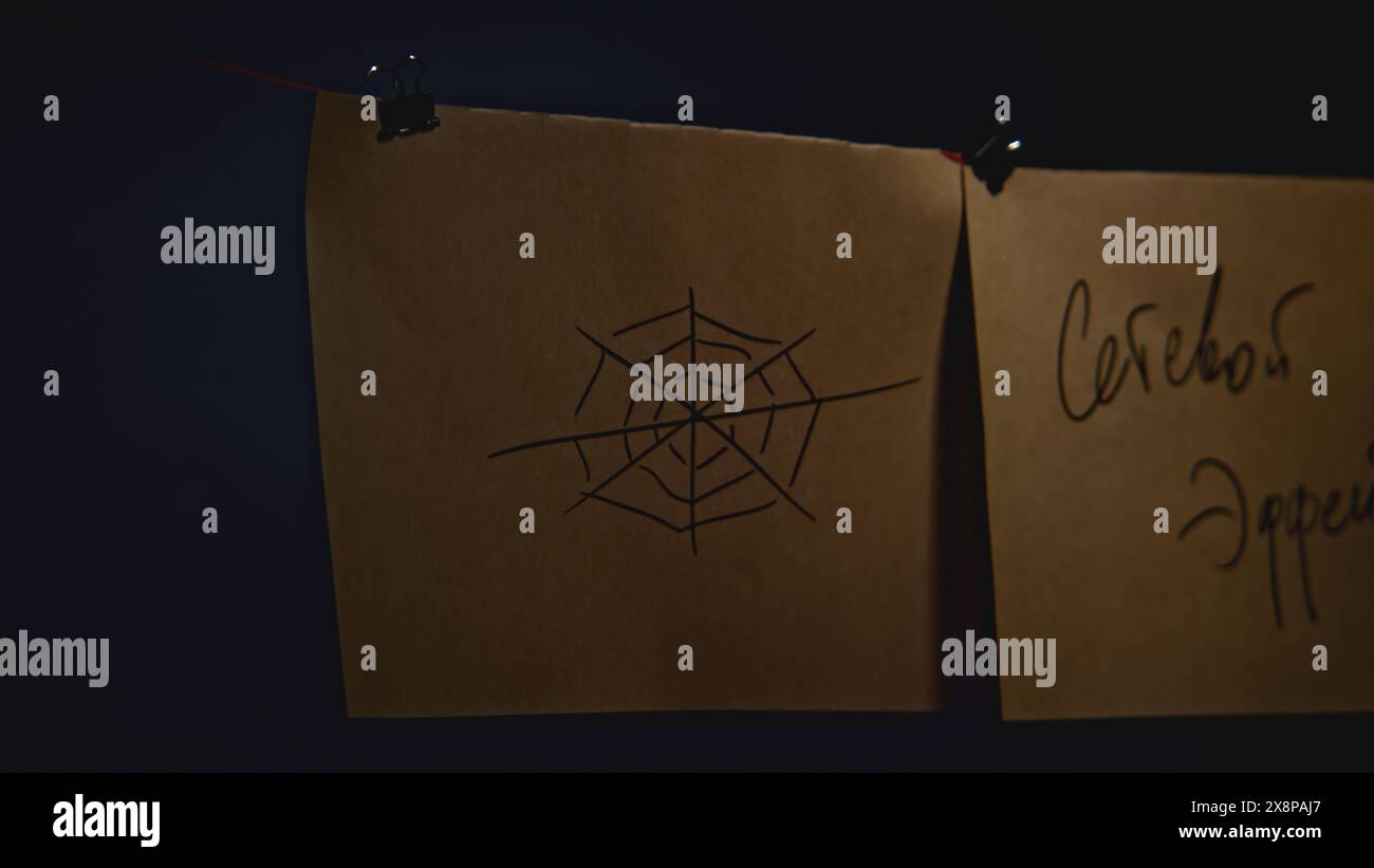 Mysterious notes on strings. Stock footage. Notes with encrypted signs ...