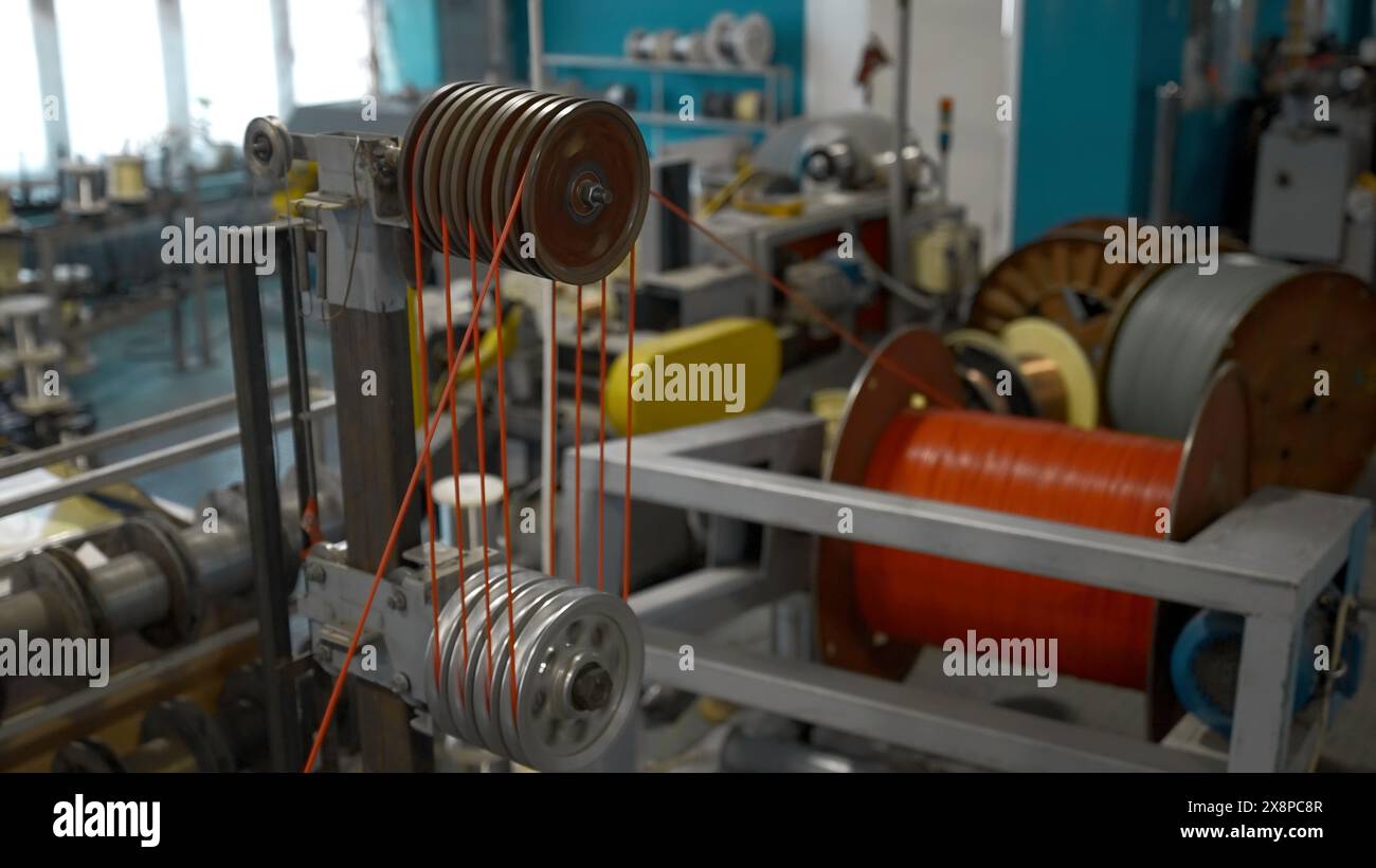 Steel wire coils at a tire factory. Creative. Rotating and reeling ...