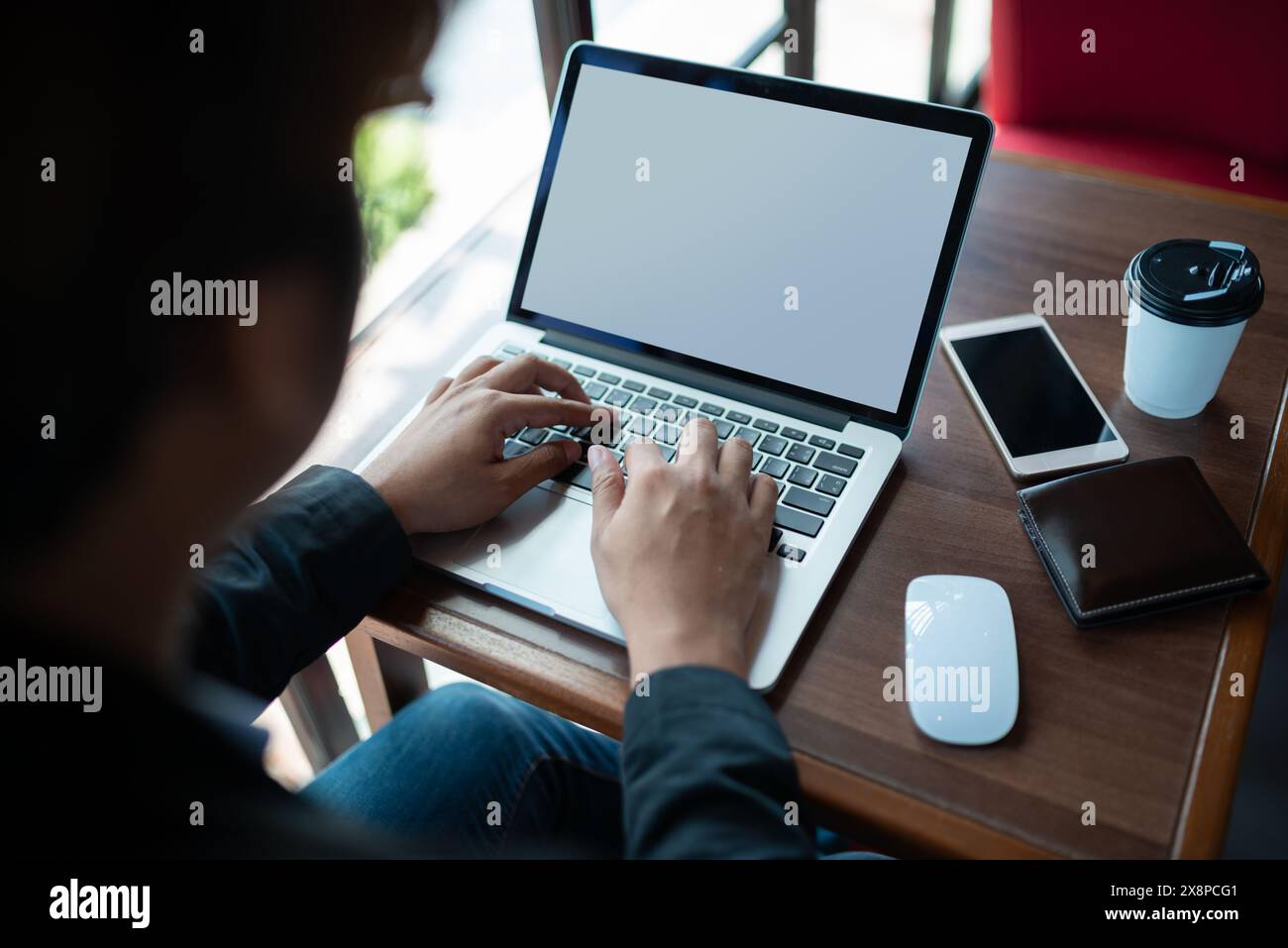 Businessman uses smartphone to share internet connection to work on ...