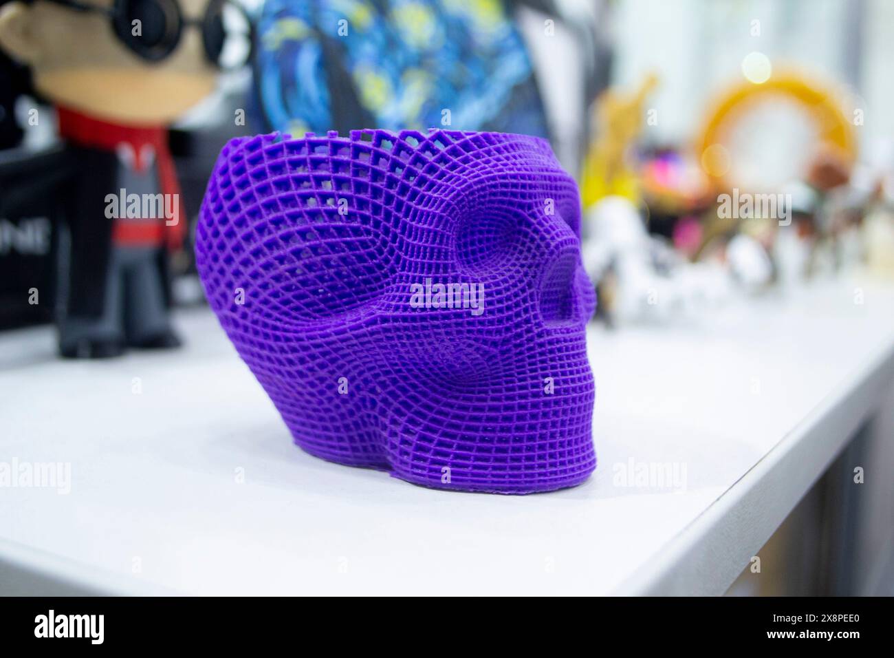 Prototype of human skull printed on 3D printer from molten purple ...