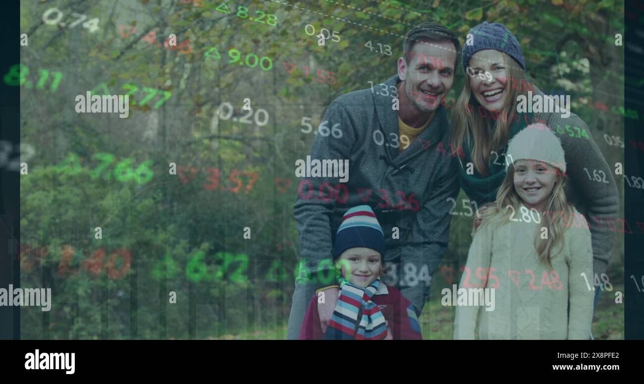Caucasian family of four smiling outdoors, with stock market numbers overlaying image Stock ...