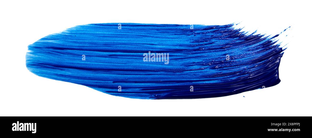 Vibrant blue paint brush stroke on a pure white background captured in ...