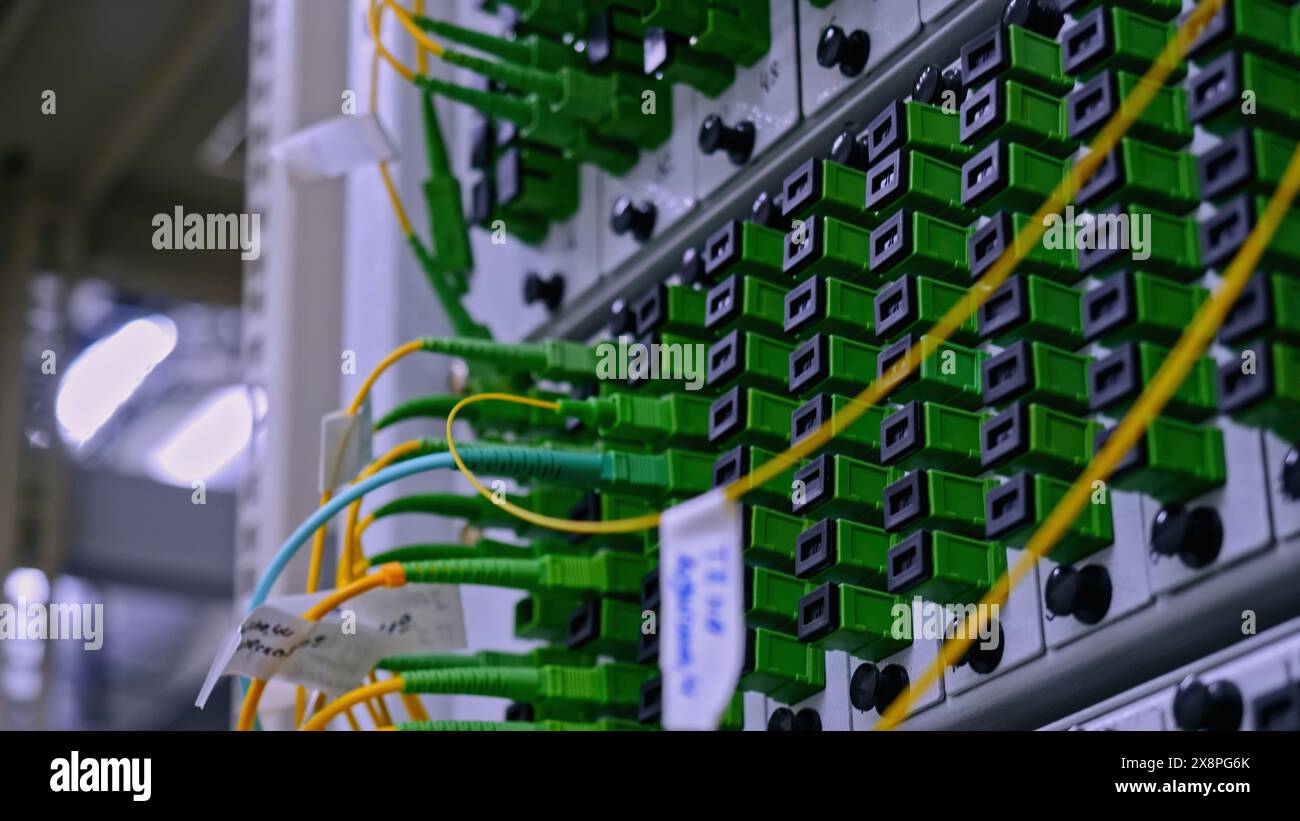 Close up of optical fiber switchboard hub in a server room. Stock ...