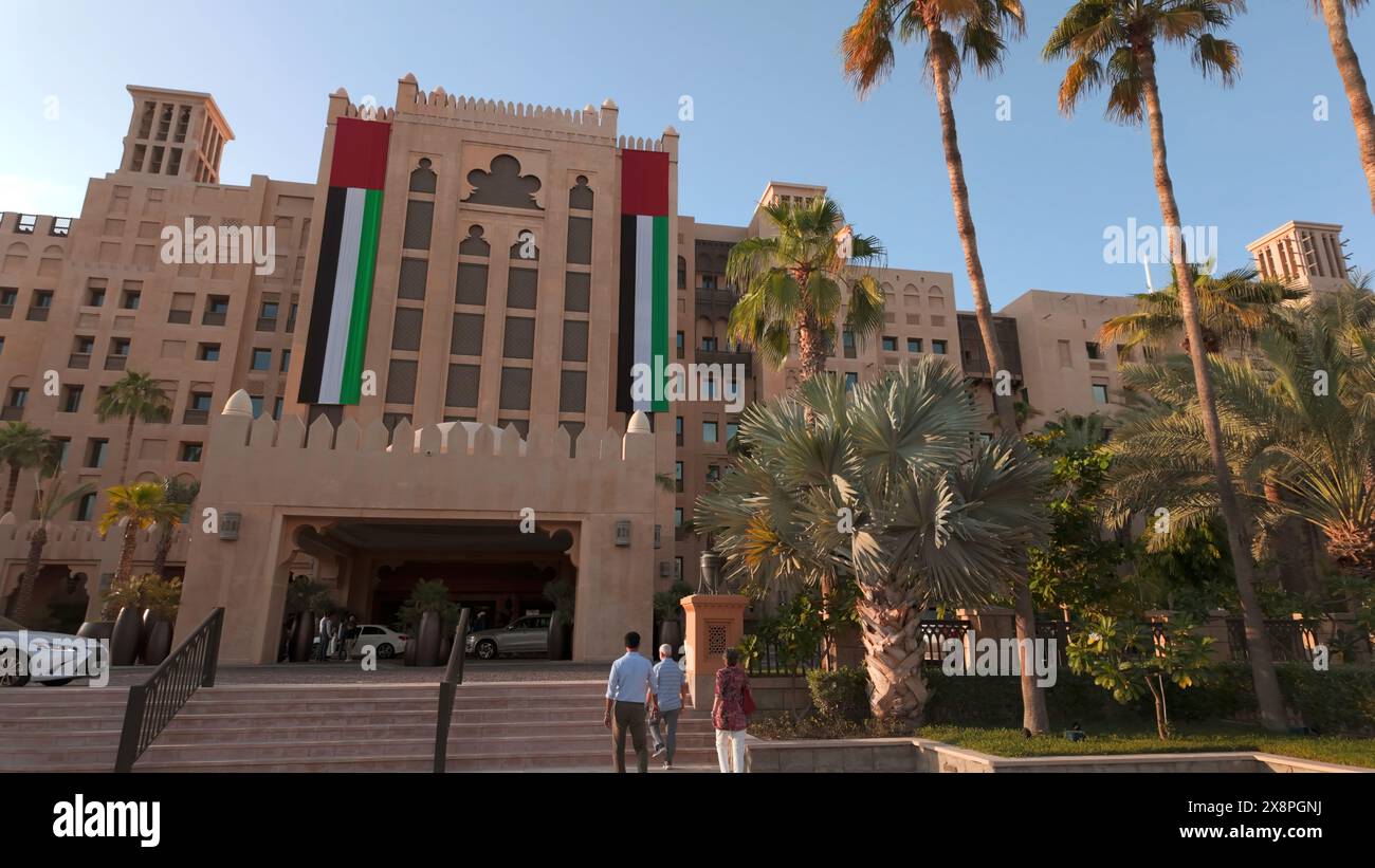 Large national flag of United Arab Emirates on a building. Action ...