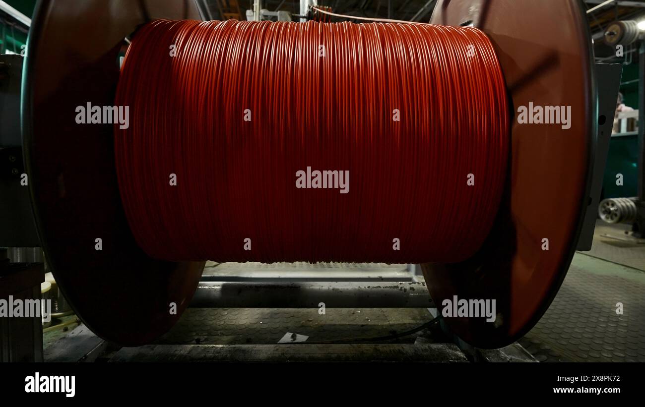 Spinning coil with copper cable close-up. Creative. Industrial ...