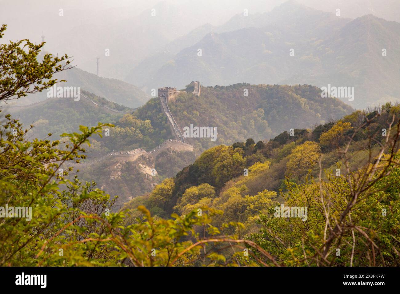 The Great Wall of China winds its way across the mountain peaks Stock ...