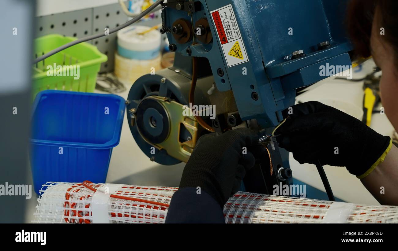 Close up of engineer soldering wires at the factory. Creative. Using ...
