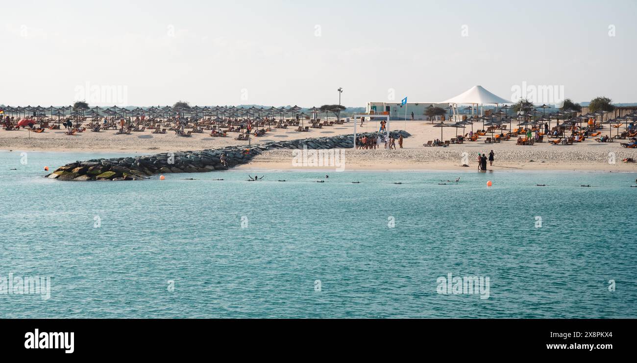 Sir Bani Yas, UAE - 5 January 2024: Visitors relish the golden sunshine ...