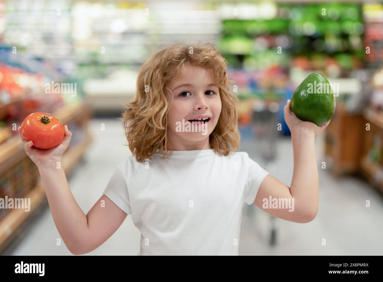 Child in food shop in food market store. Kids shopping in food shop ...