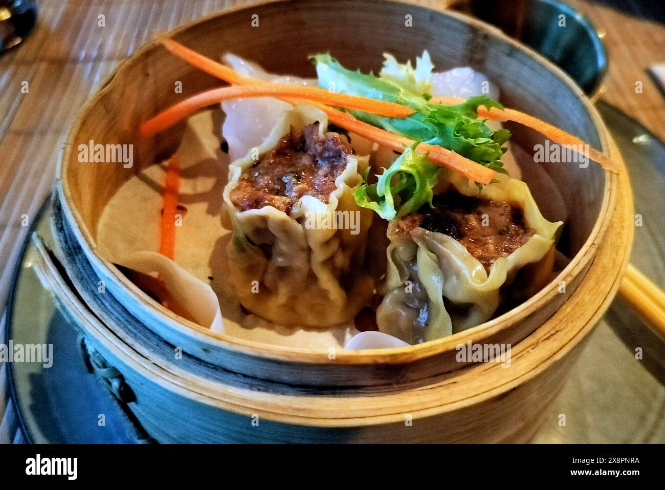 Dim Sum set in bamboo steaming tray Stock Photo - Alamy