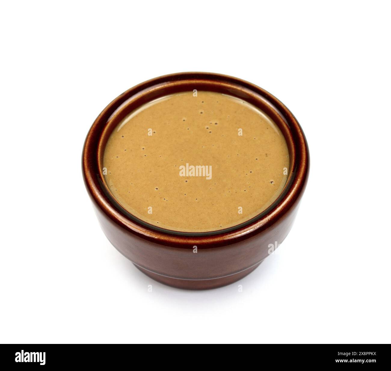 Sesame sauce. Tahini isolated on white background Stock Photo - Alamy
