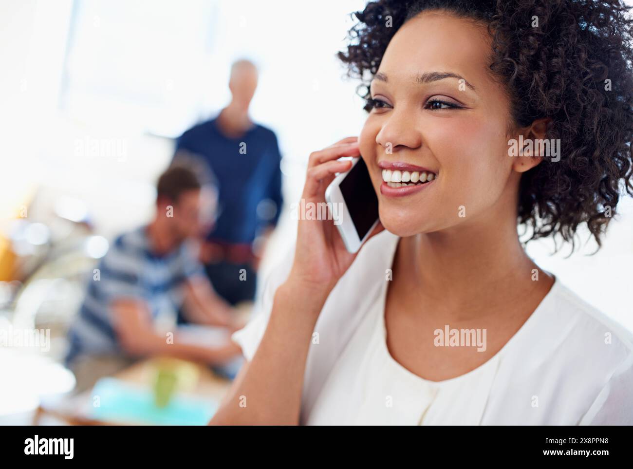 Creative, phone call and woman in meeting, listening and team building ...