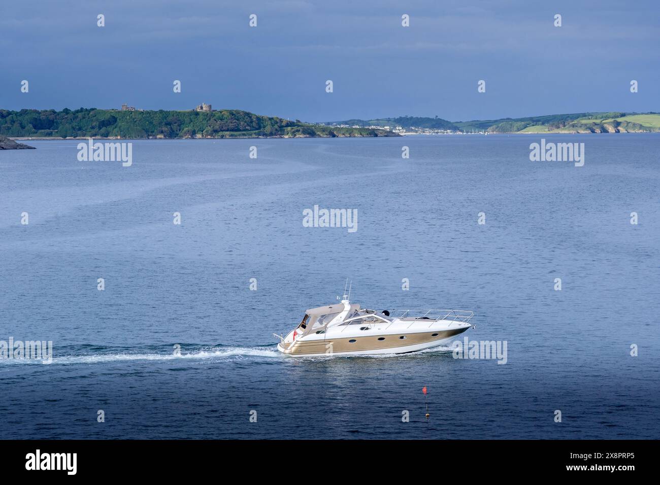 Motorboat on an evening trip around Falmouth Bay, Cornwall. Pendennis ...