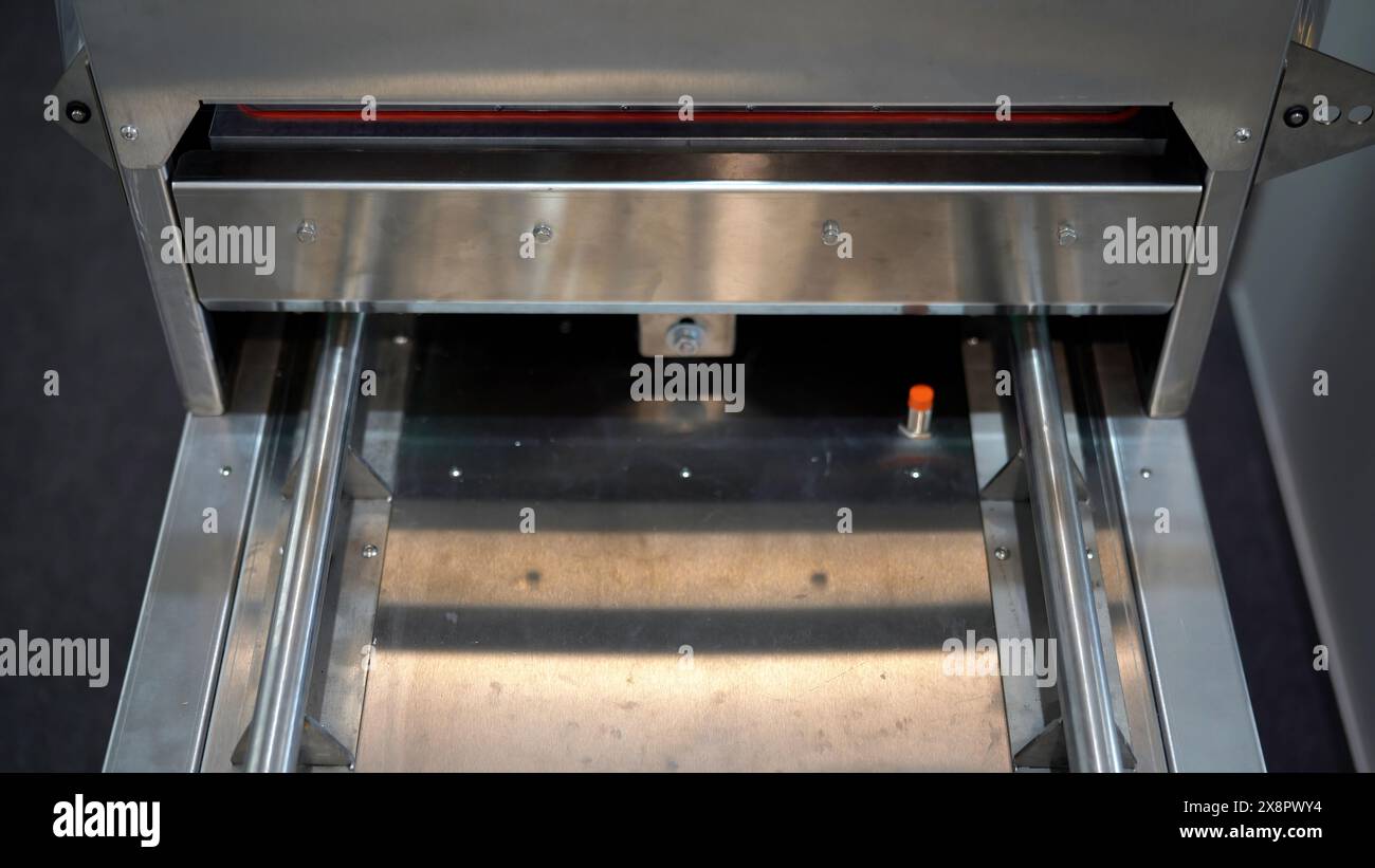 Production of plastic packages, industrial background. Media. Close up ...