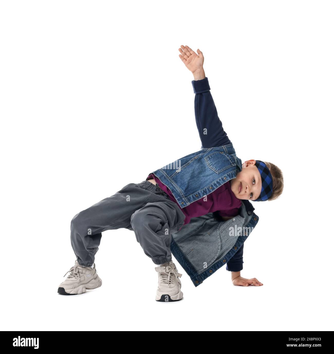 Happy little boy dancing on white background Stock Photo - Alamy