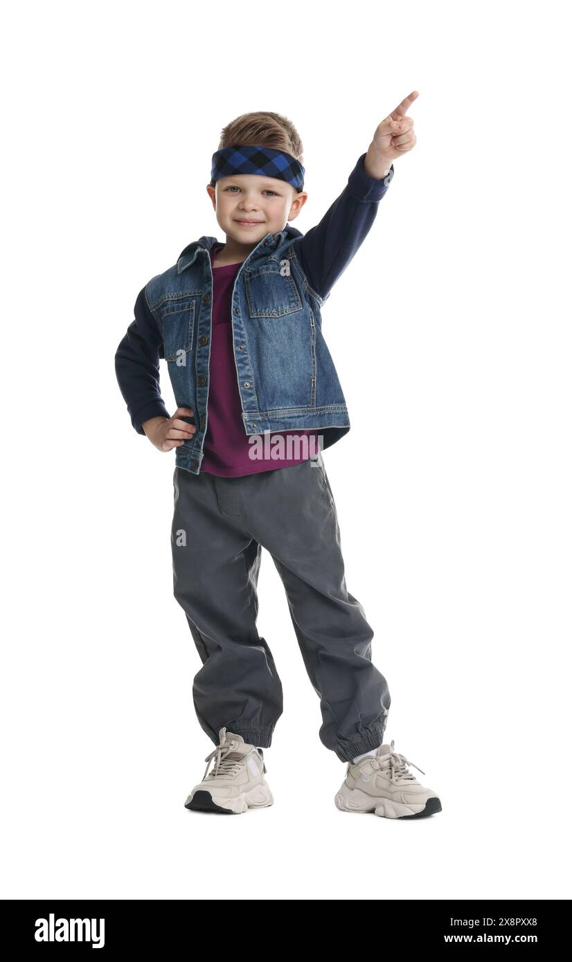 Happy little boy dancing on white background Stock Photo - Alamy