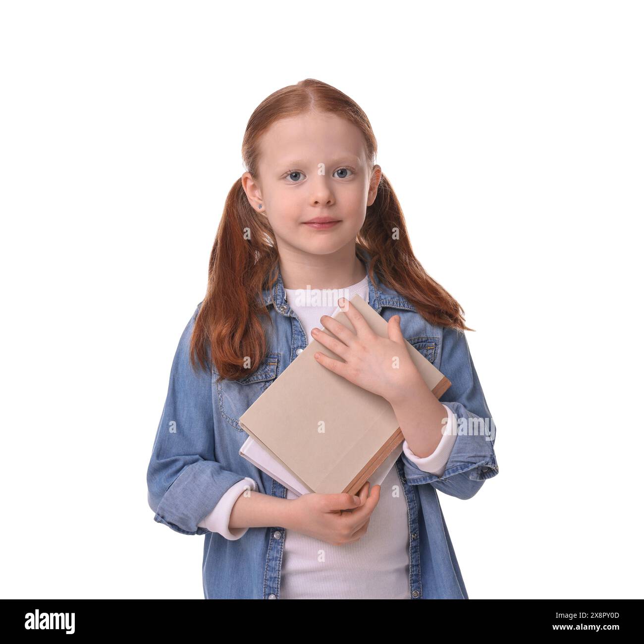 Cute little girl with books on white background Stock Photo - Alamy
