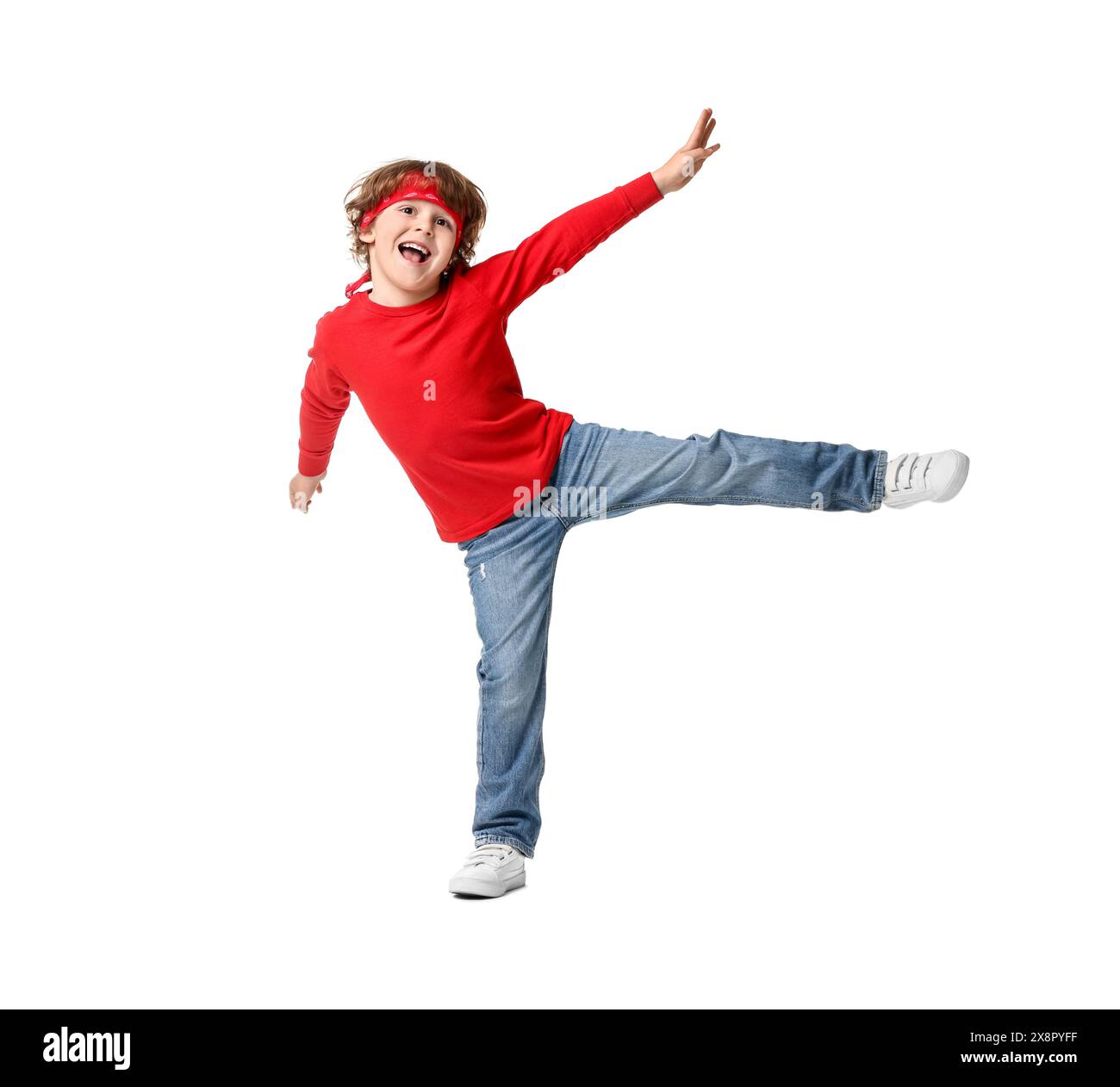 Happy little boy dancing on white background Stock Photo - Alamy
