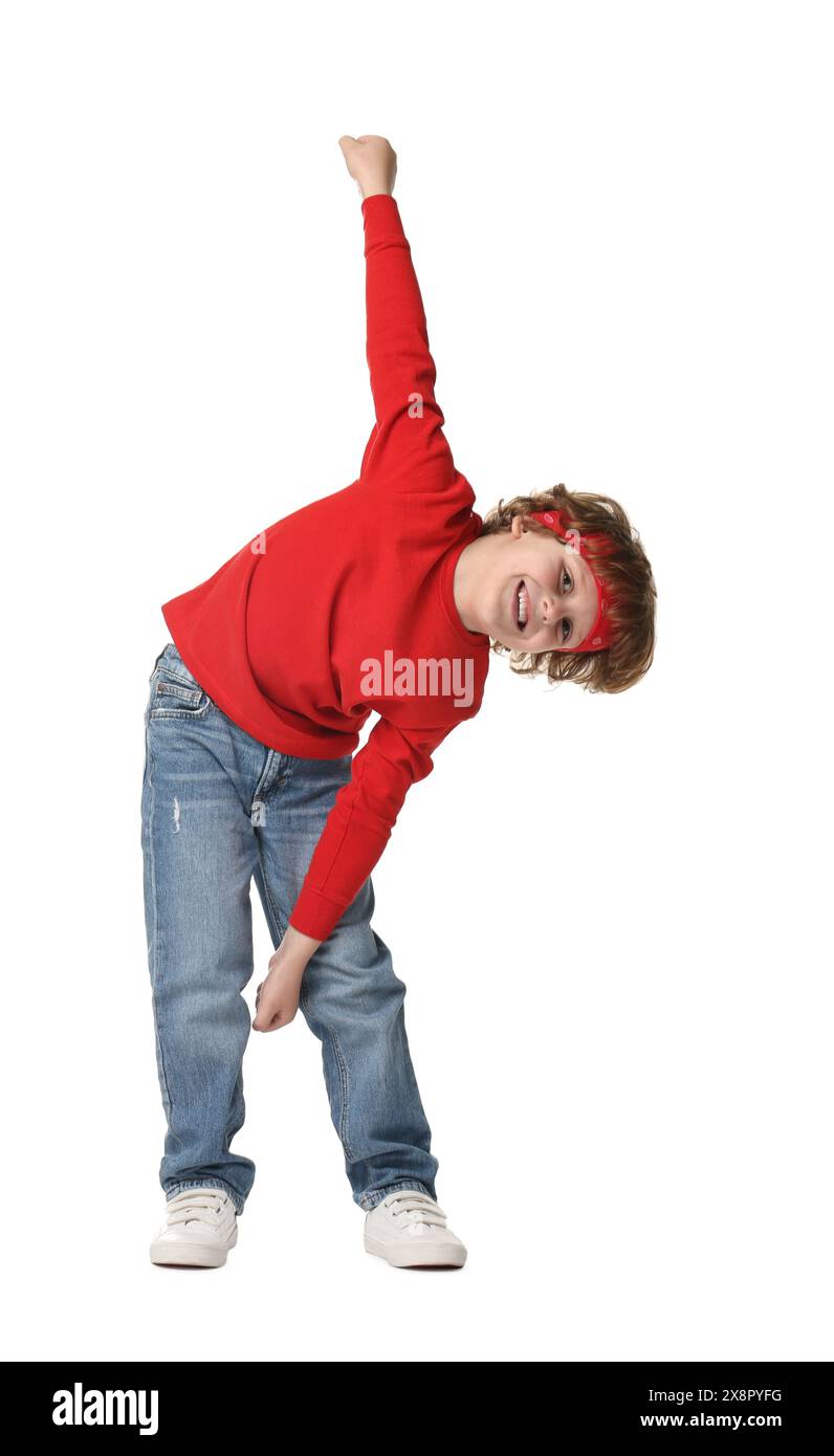 Happy little boy dancing on white background Stock Photo - Alamy