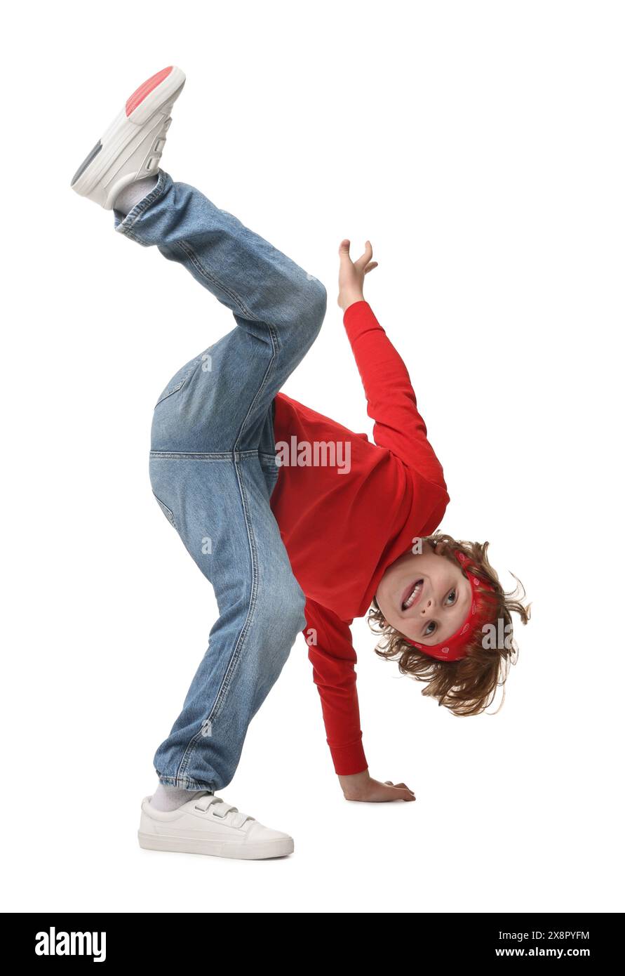Happy little boy dancing on white background Stock Photo - Alamy