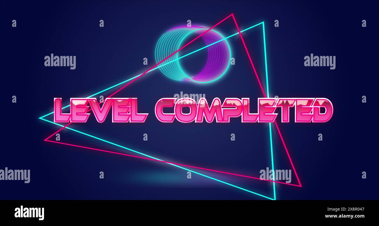 Image of level completed text on triangular banner over spiral shape ...