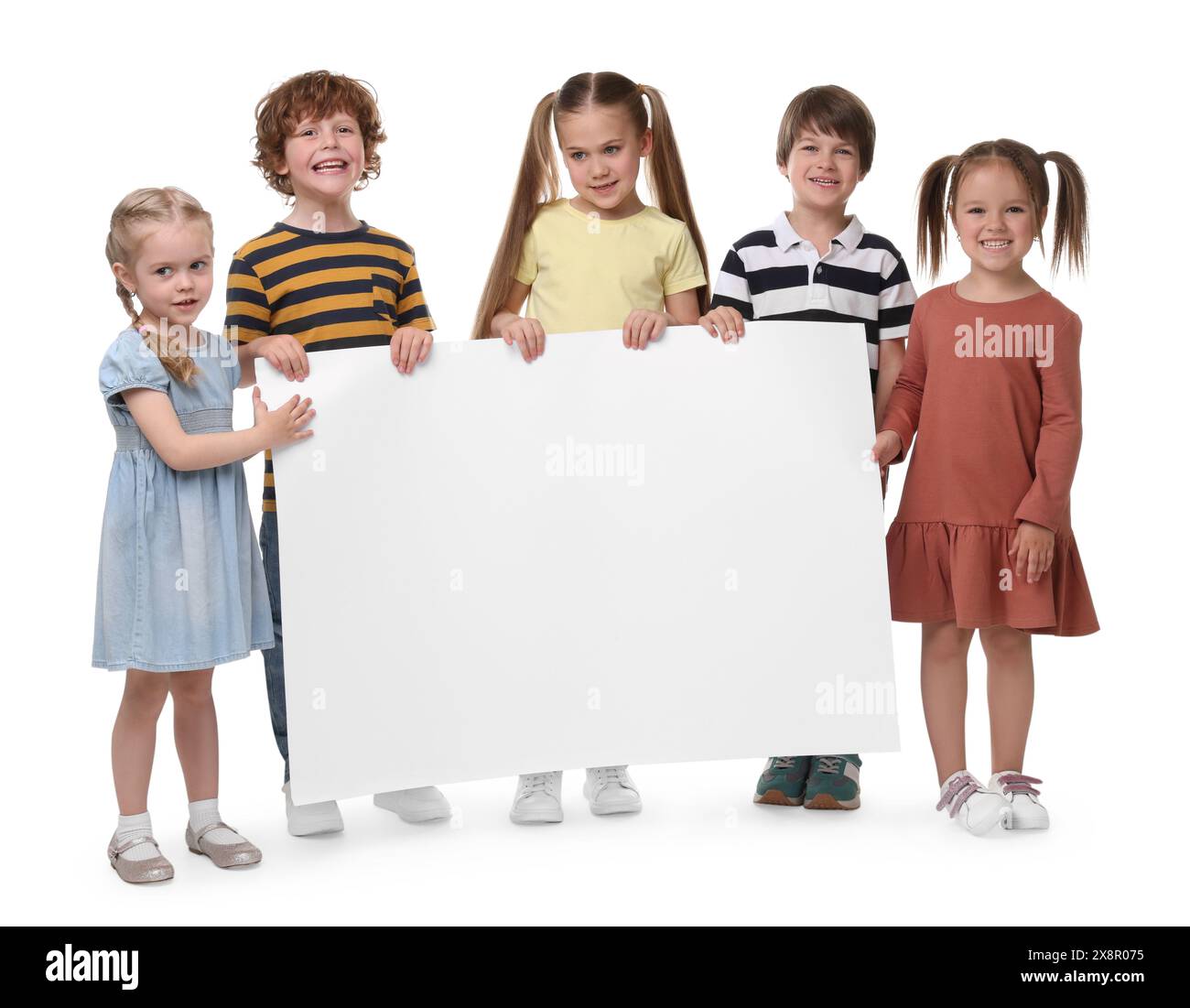 Group of children with blank poster on white background. Mockup for ...