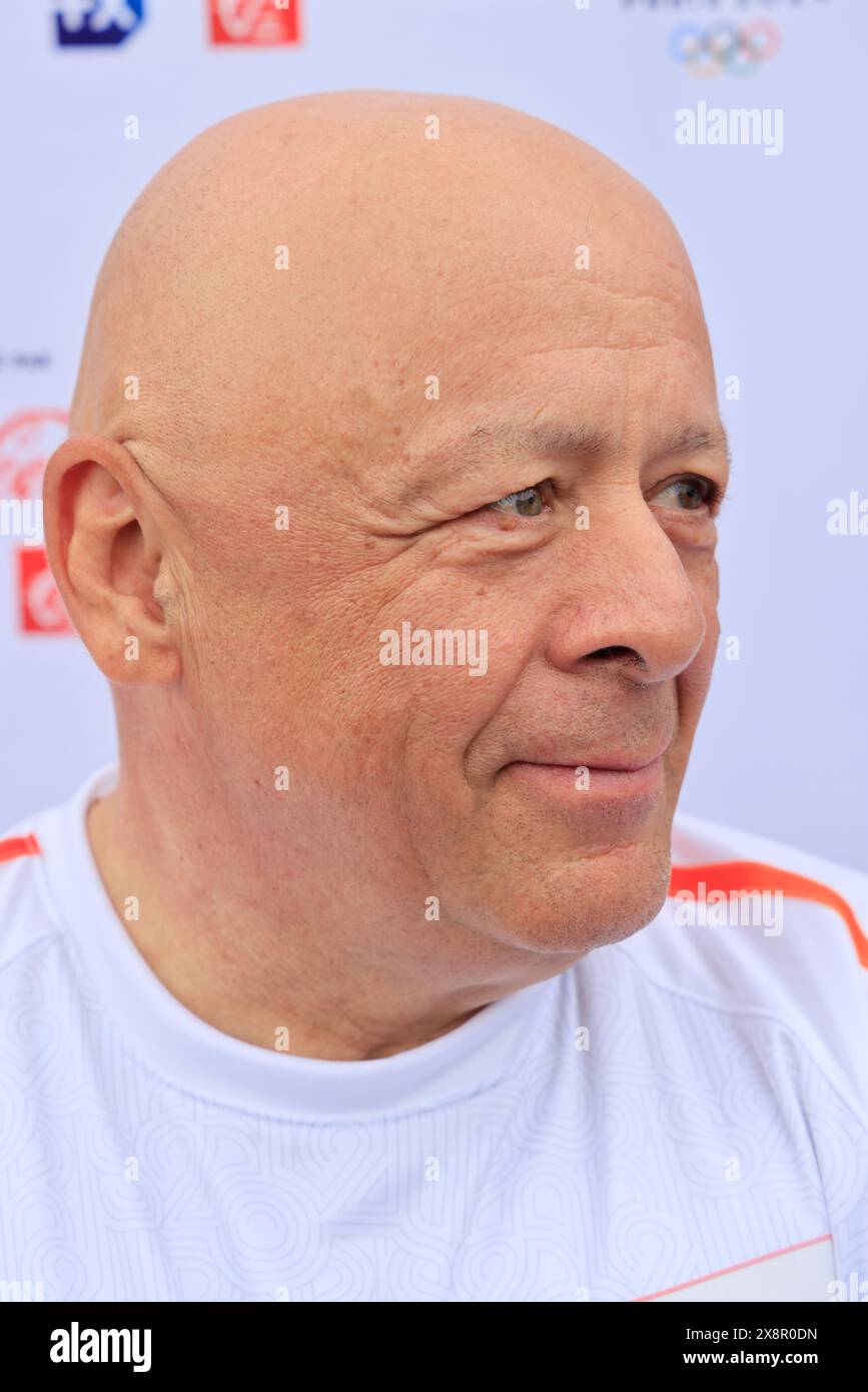 Bearer of the 2024 olympic torch relay hi-res stock photography and ...