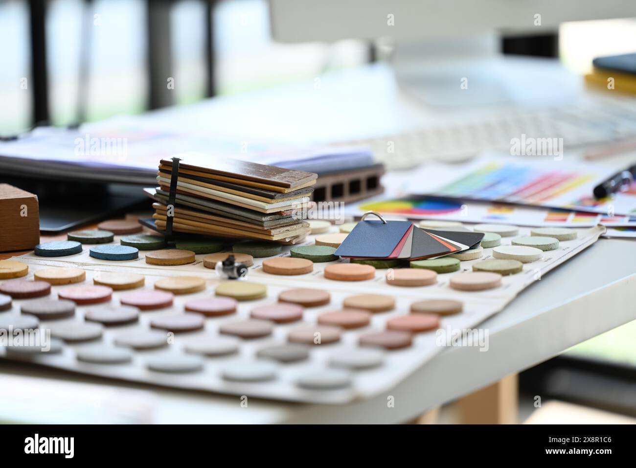 Material sample and color swatches on interior designer working desk ...