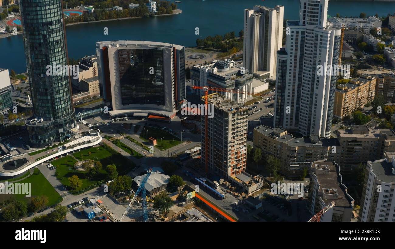 Top view of construction of building in city center with high-rise ...
