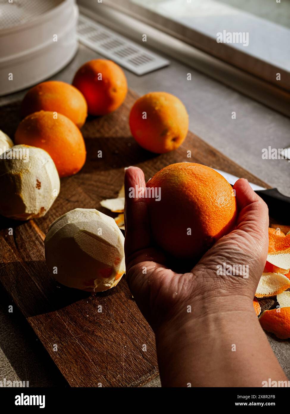 Peeled oranges hi-res stock photography and images - Alamy