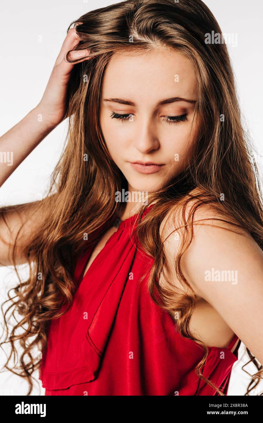 High key studio portrait of beautiful teenage girl with long hair Stock ...