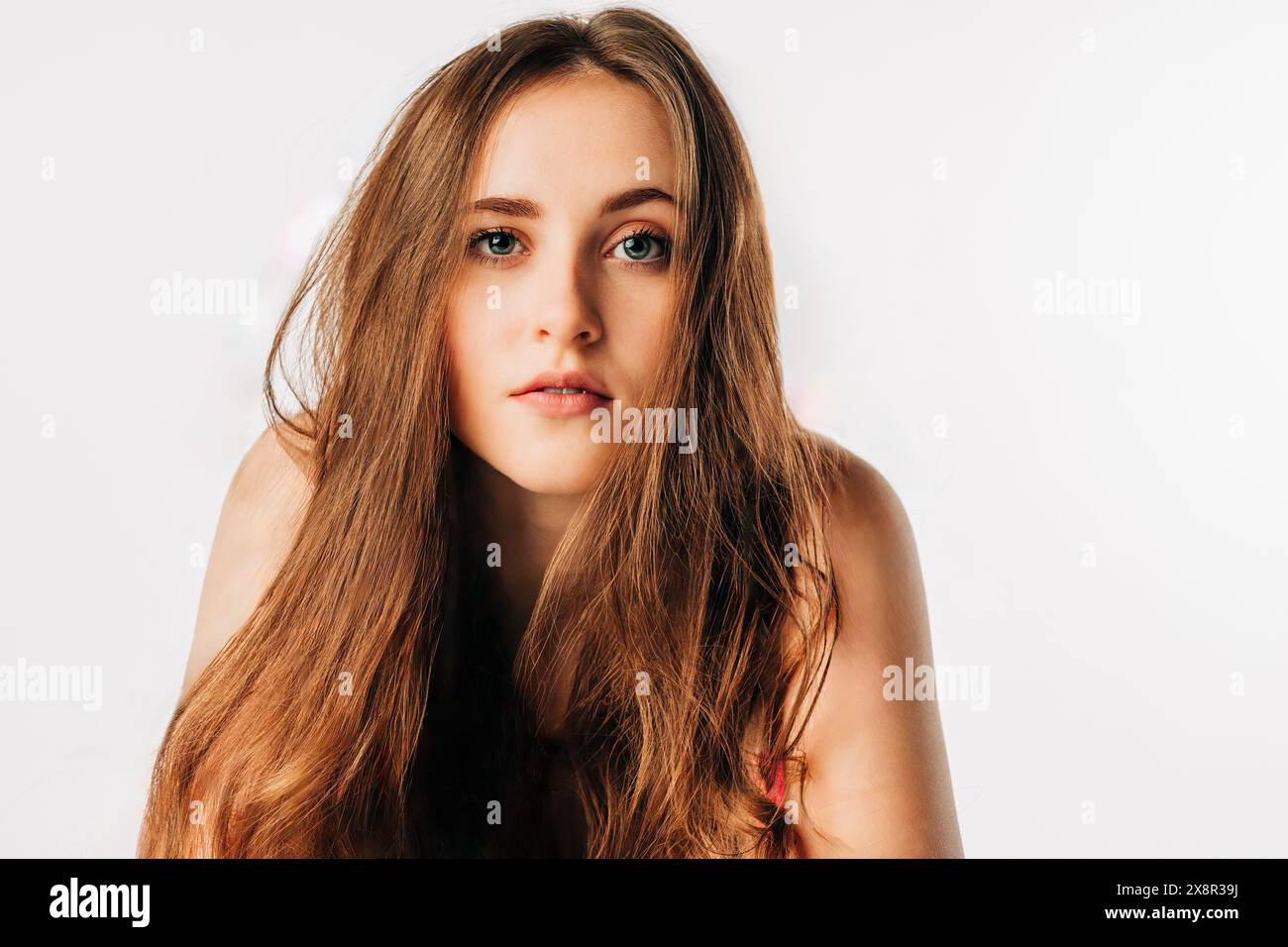 High key studio portrait of pretty teen girl with long hair Stock Photo ...