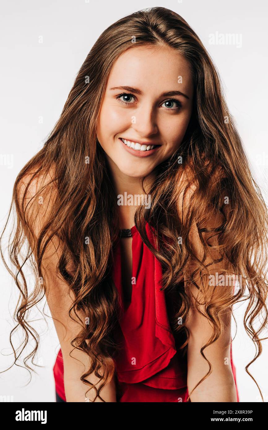 High key studio portrait of beautiful smiling teenage girl Stock Photo ...