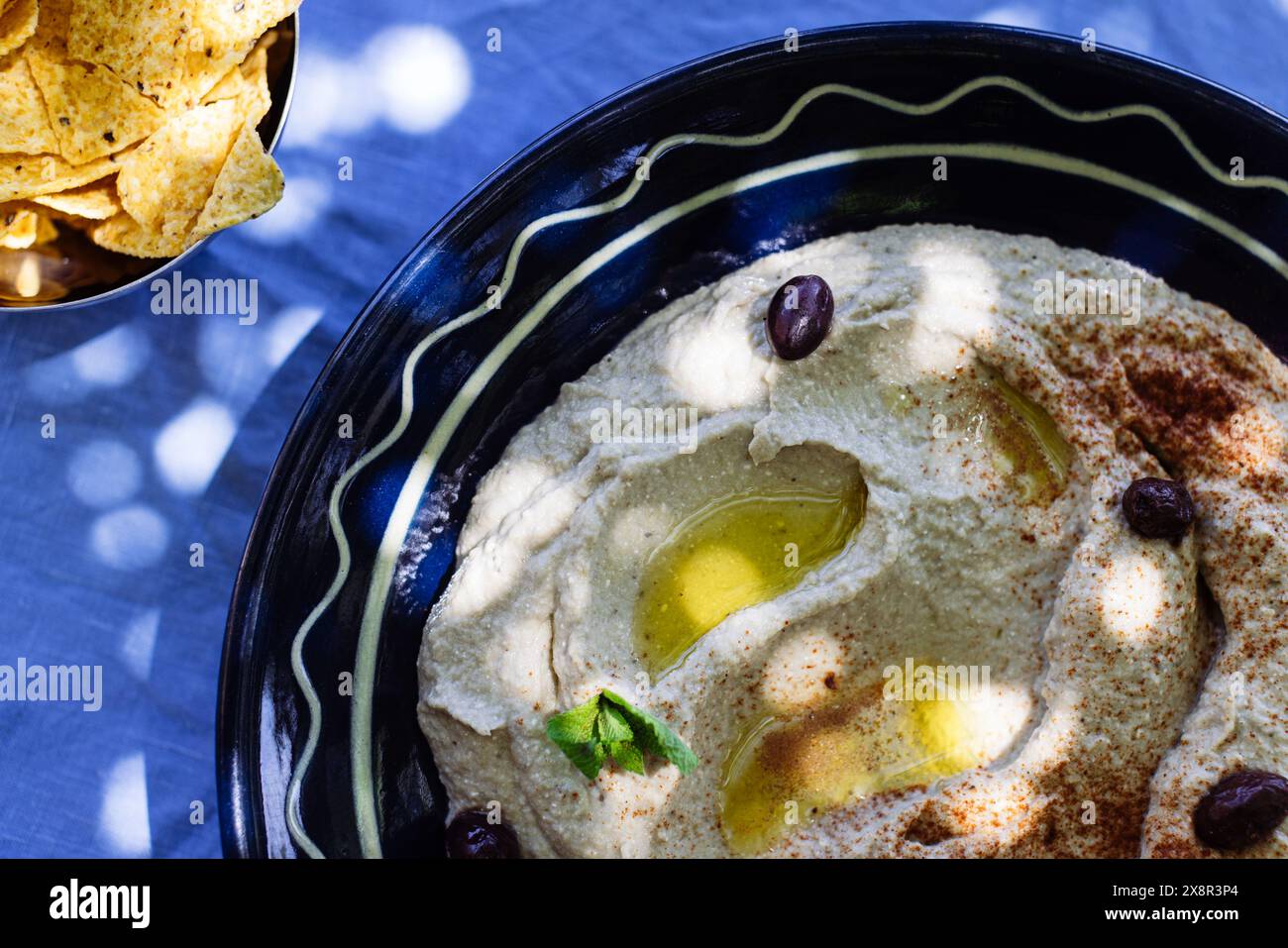 Hummus served in a garden of an old stone house in Catalonia, Spain ...