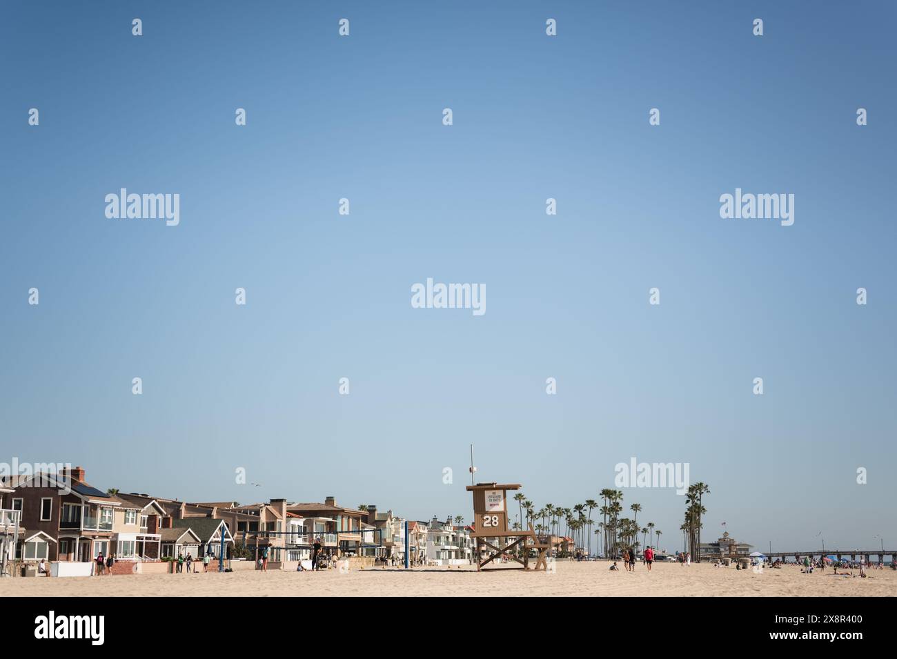 Newport Beach, CA, USA -March 20, 2024 - People enjoying Newport beach ...