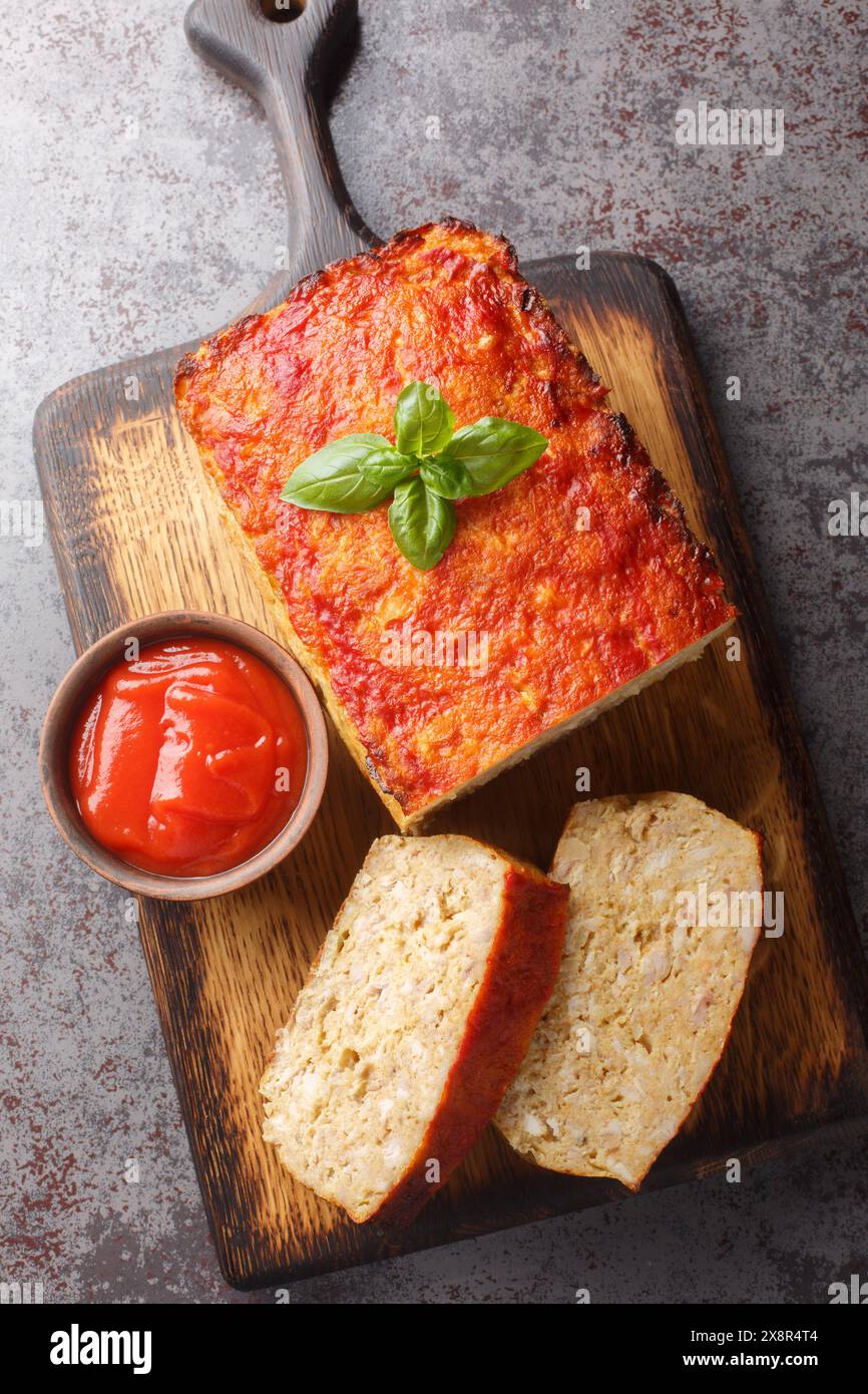 Homemade meatloaf or terrine with mix of chicken and turkey meat glazed ...