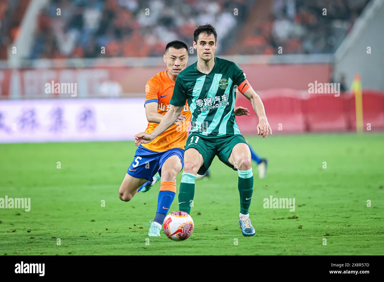 Shandong Taishan Football Club defeated Zhejiang Professional Football ...