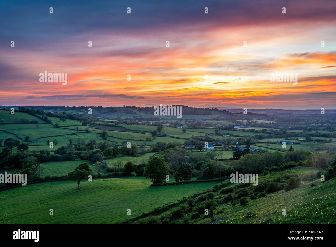 Landscape of rural Dorset by sunset, hilltop view of the area around ...