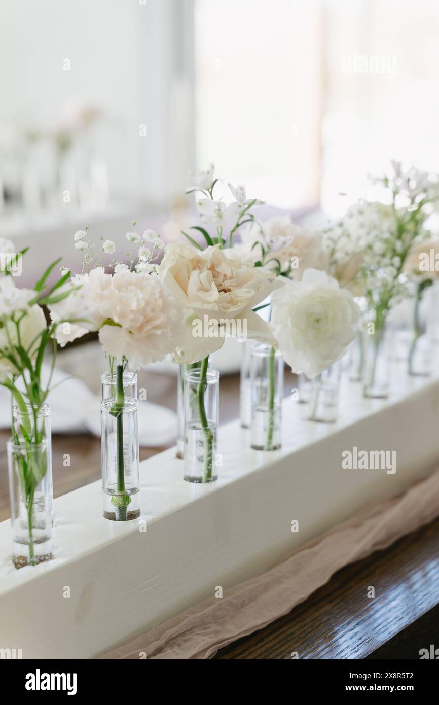 single stem bud vases as table decor at wedding reception Stock Photo ...