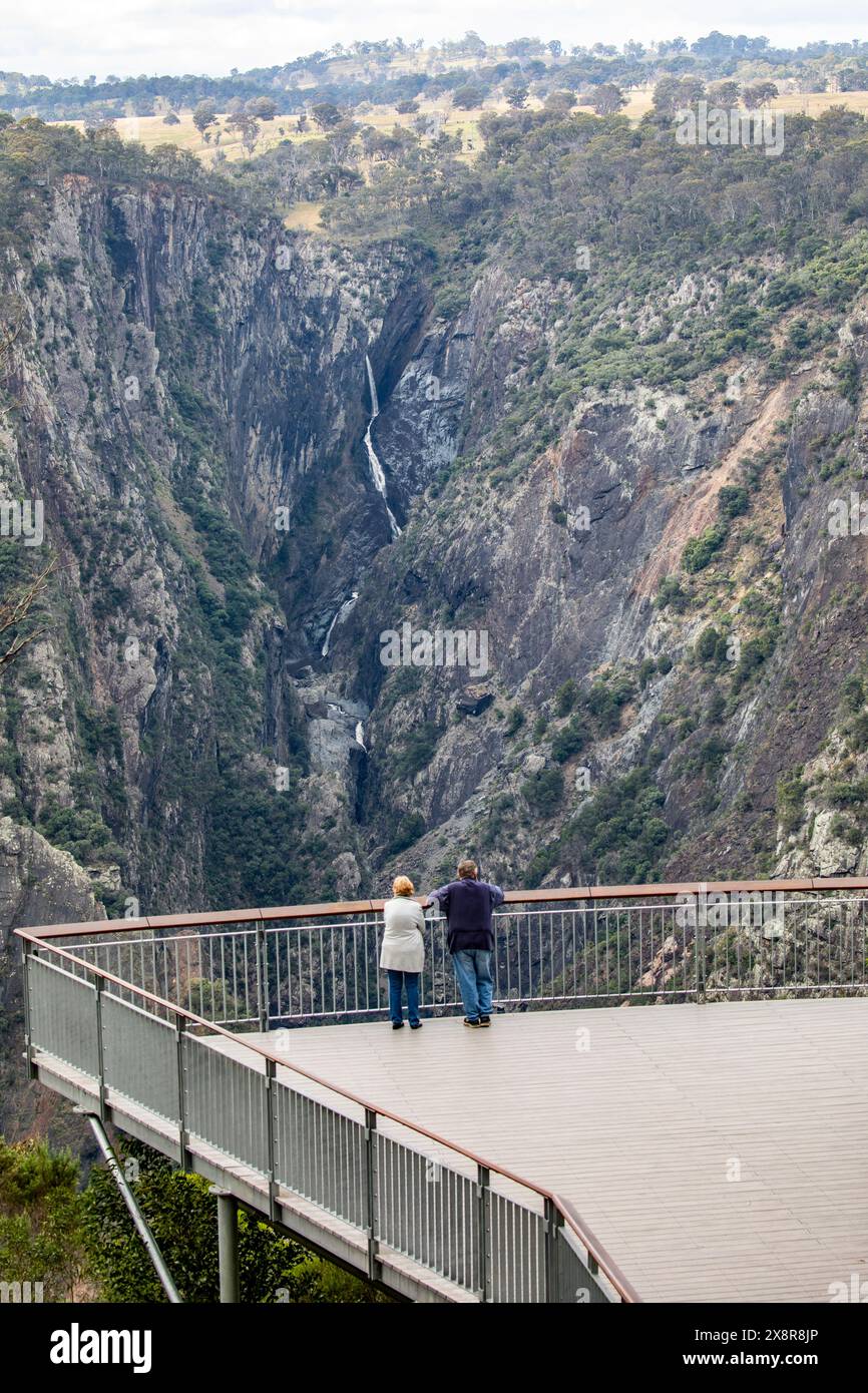 Wollomombi and Chandler waterfalls falls, couple on viewing platform ...