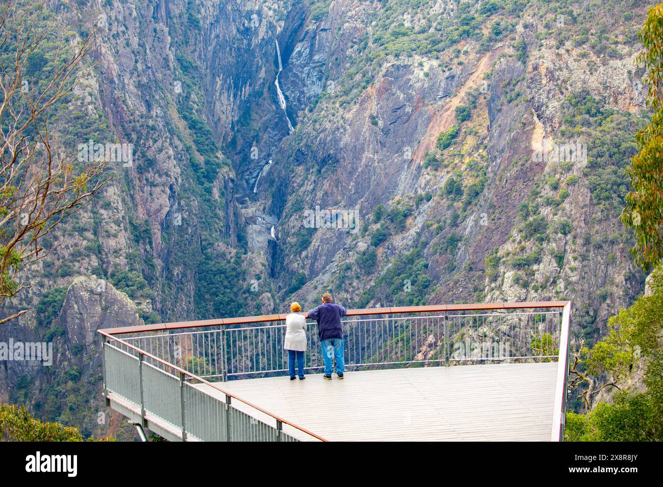 Wollomombi and Chandler waterfalls falls, couple on viewing platform ...