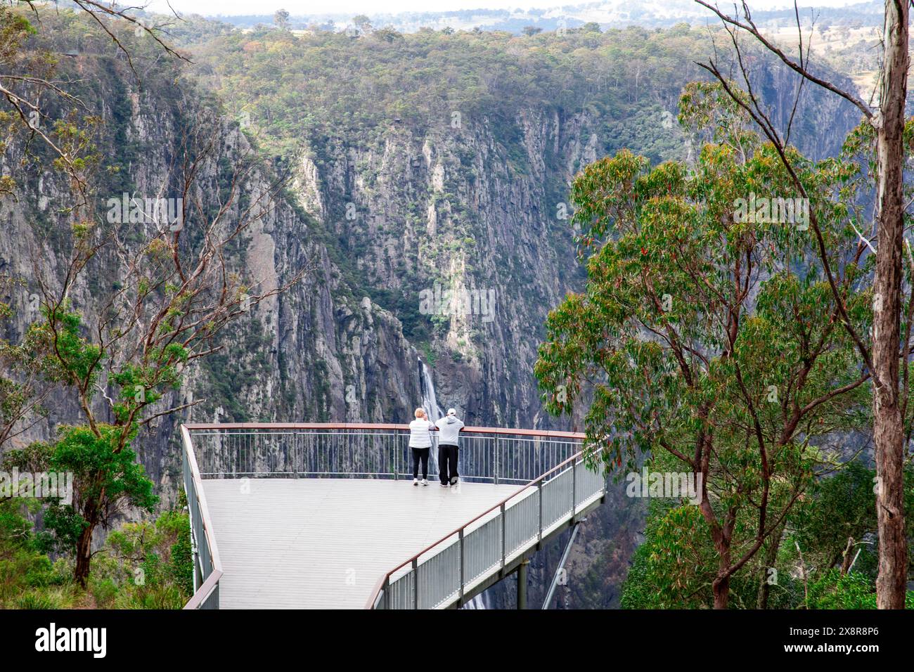 Wollomombi and Chandler waterfalls falls, couple on viewing platform ...