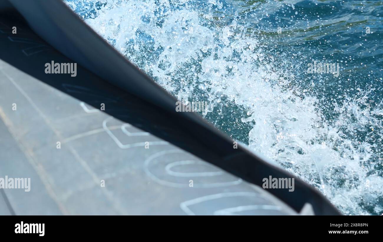 Waves from floating sea vessel. Clip. Beautiful moving waves from ...