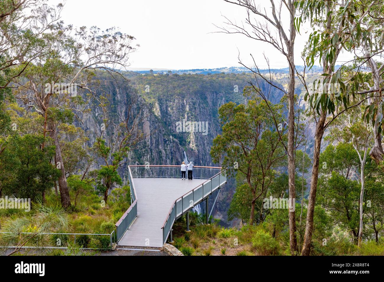 Wollomombi and Chandler waterfalls falls, couple on viewing platform ...