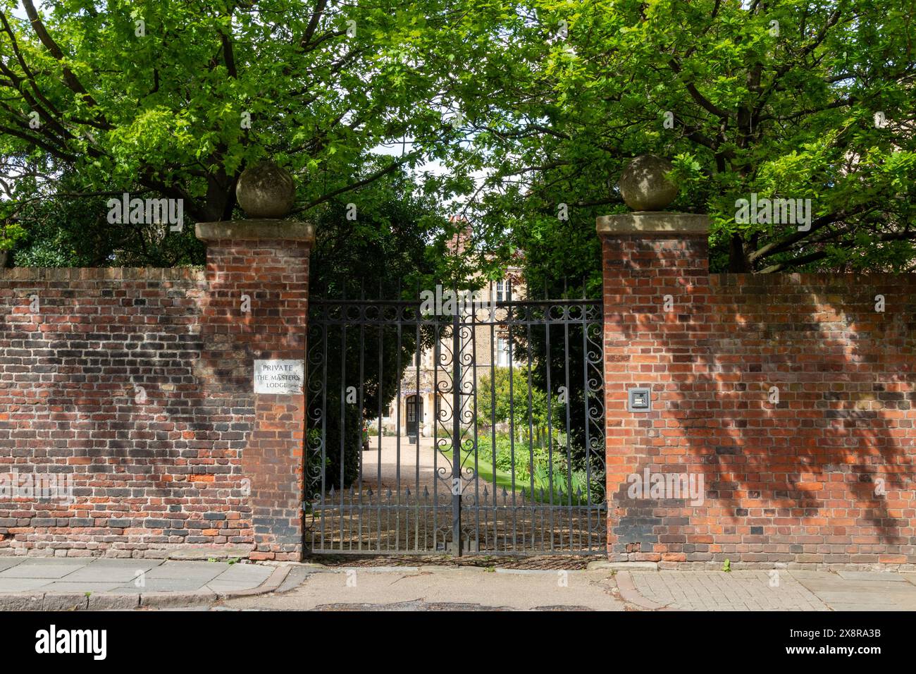 The wrought iron gate at the entrance to The Masters Lodge, Jesus ...