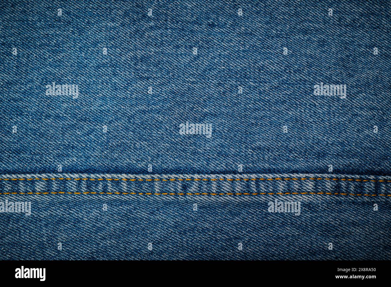 closeup jean fabric texture with stitch backgrounds Stock Photo - Alamy
