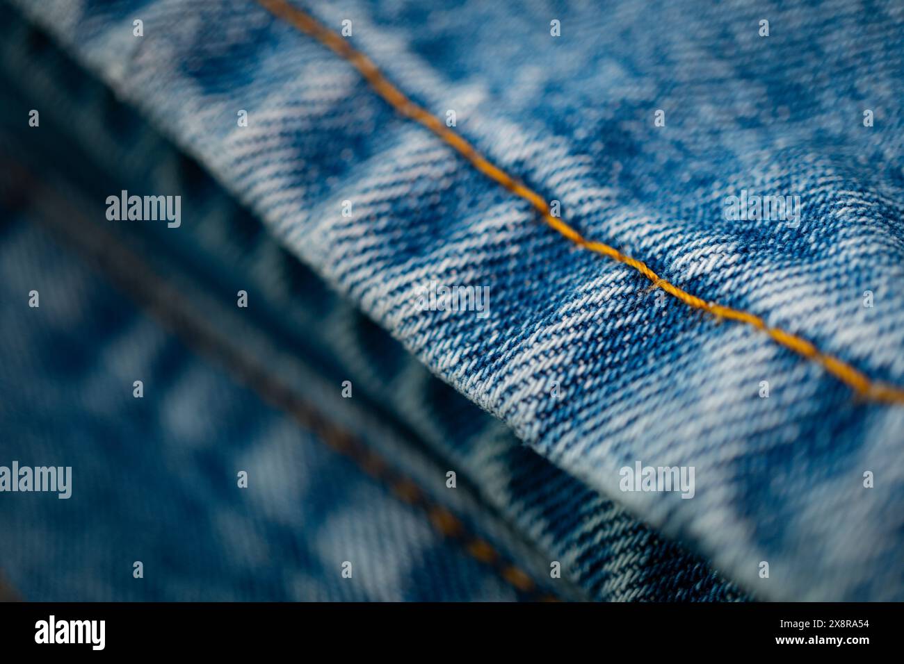 closeup jean fabric texture with stitch backgrounds Stock Photo - Alamy